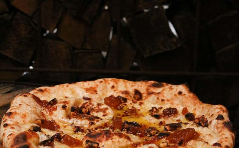 Baked in Brick: 50% off the first table of the night with First Table